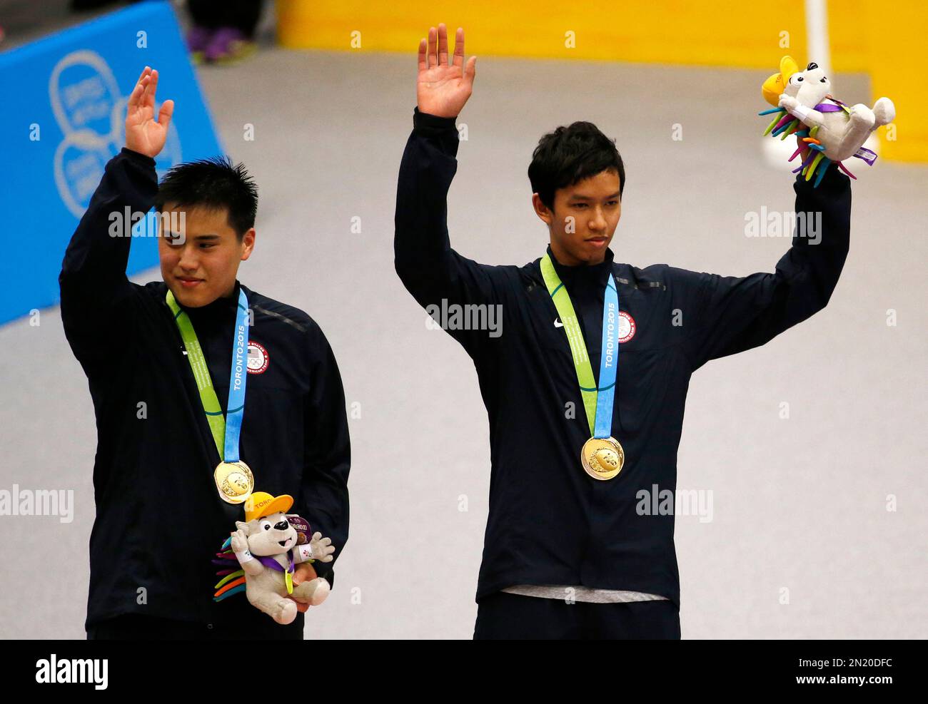 United States' Phillip Chew, left, and Sattawat Pongnairat wear their ...