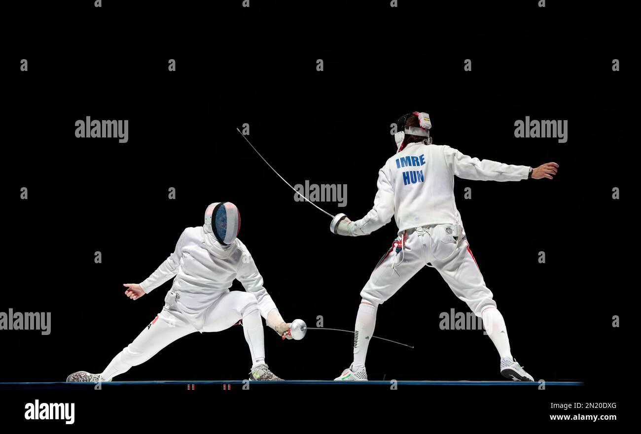 Geza Imre, of Hungary, right, fights Gauthier Grumier, of France, to ...