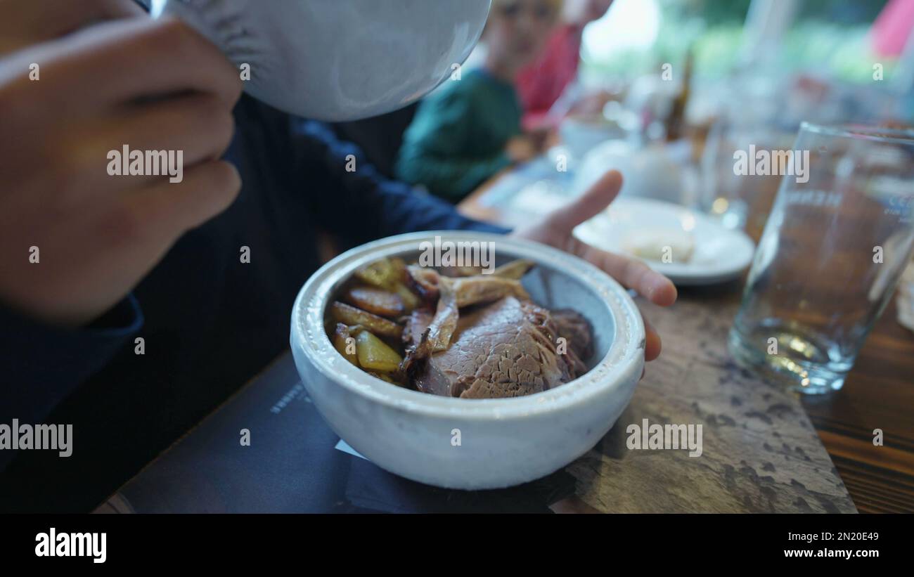 Opening top plate food dish at restaurant revealing meal Stock Photo ...