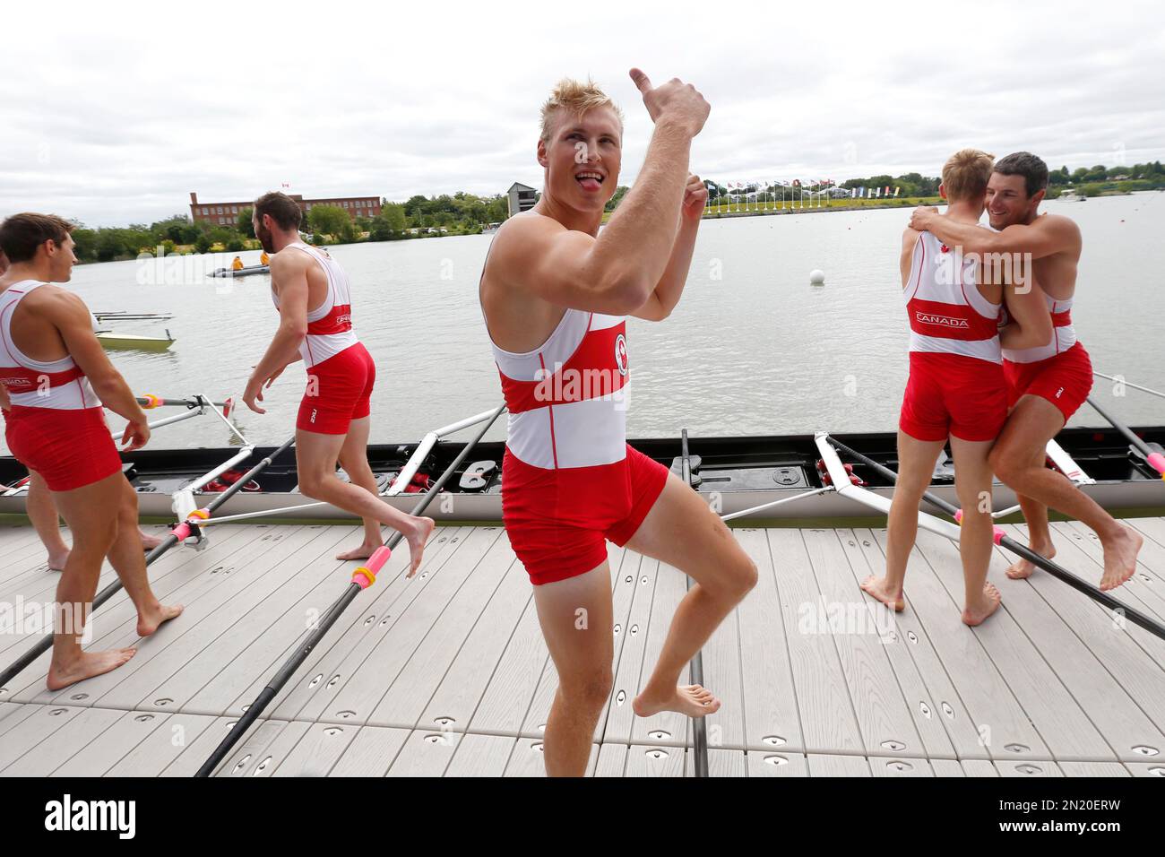Canada's Tim Schrijver, center, reacts after his team won the gold ...
