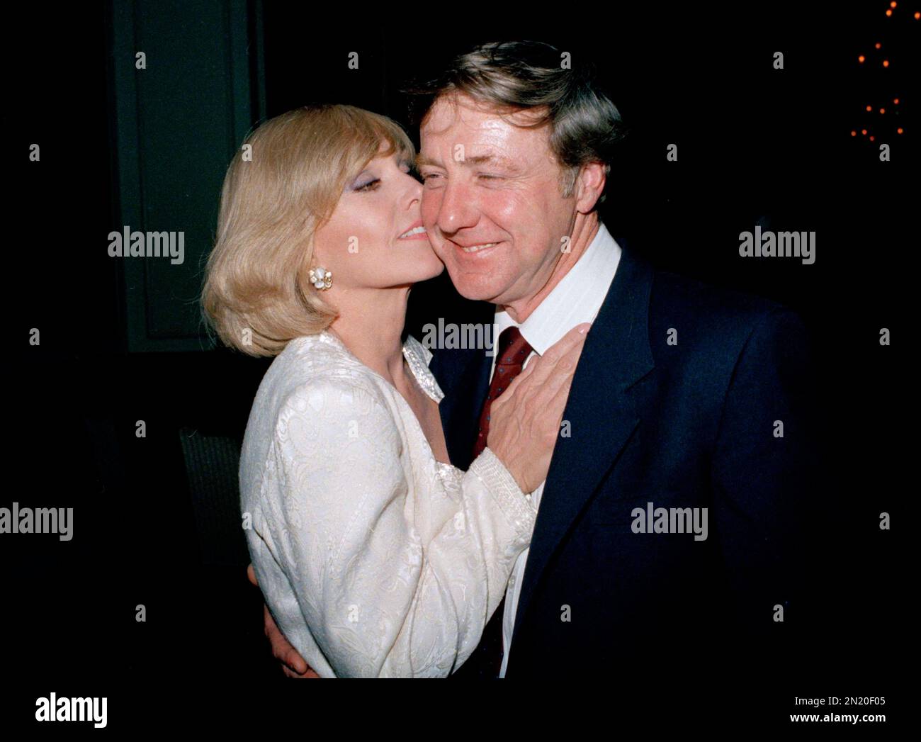 Kim Novak kisses her husband Dr. Robert Malloy, Nov. 1986. (AP Photo ...