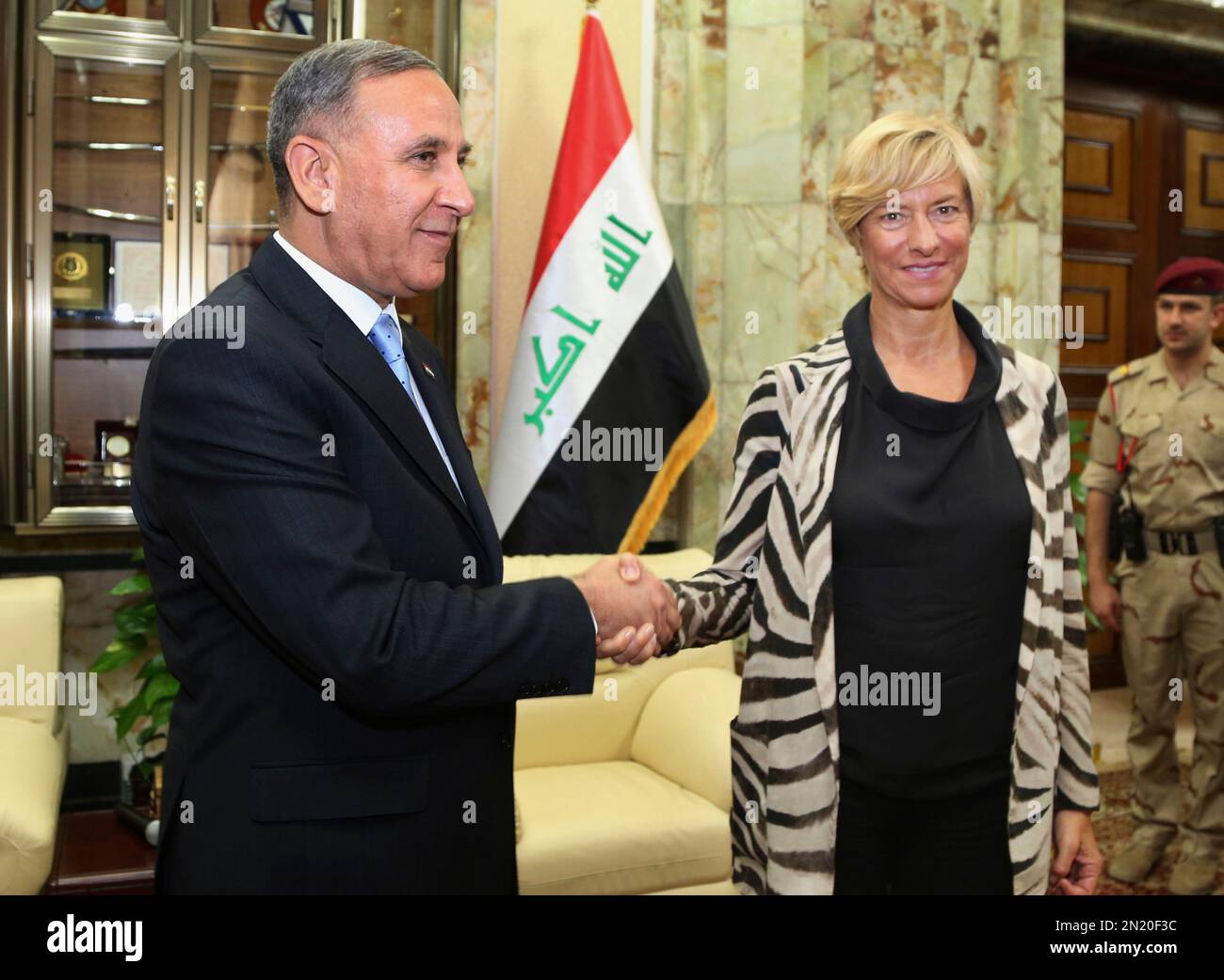 Italian Minister of Defense Roberta Pinotti, right, and her Iraqi ...