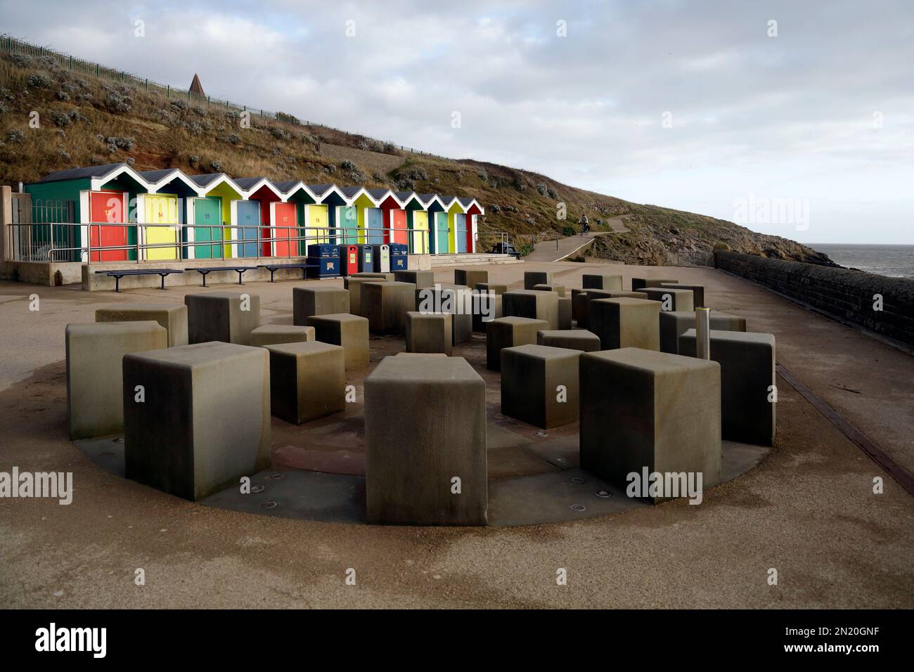 Colourful beach huts and Ammonite water feature, promenade, Barry ...