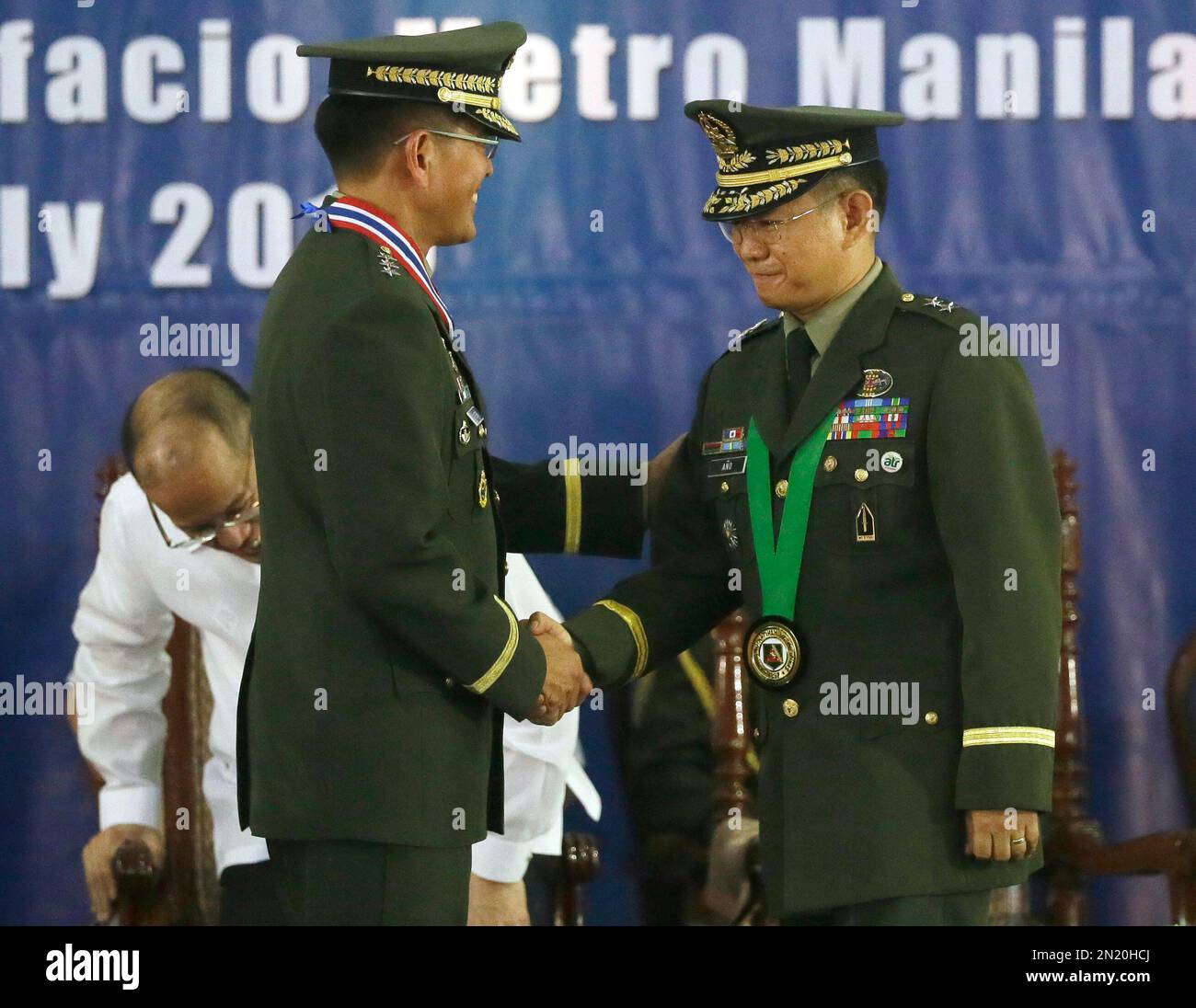 Incoming Philippine Army chief Maj. Gen. Eduardo M. Ano, right, is ...