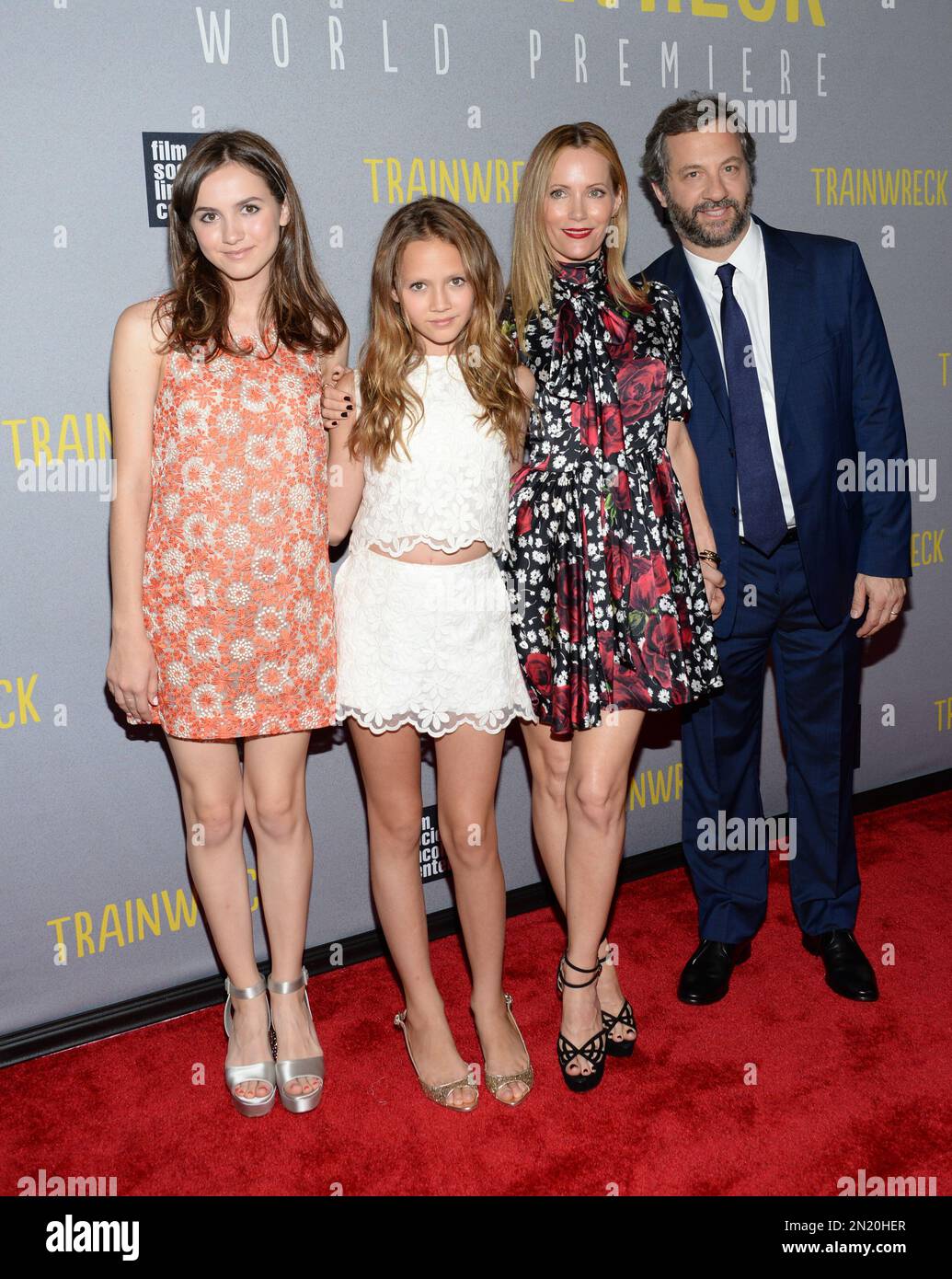 Director/producer Judd Apatow poses with his wife Leslie Mann and their daughters Maude Apatow ...