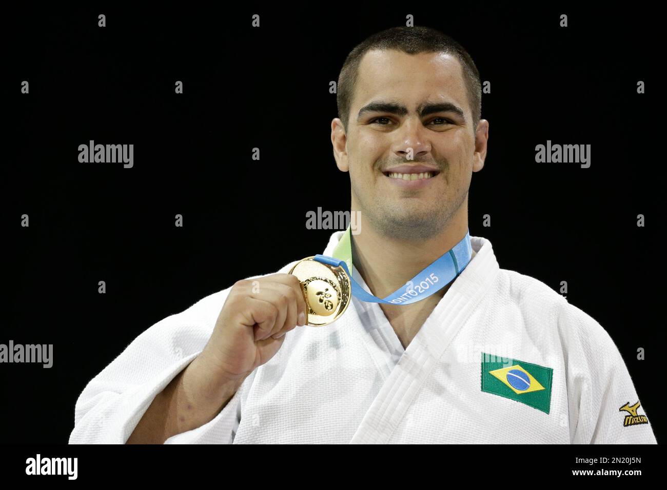 Brazil's David Moura holds his gold medal earned at the men's +100kg ...