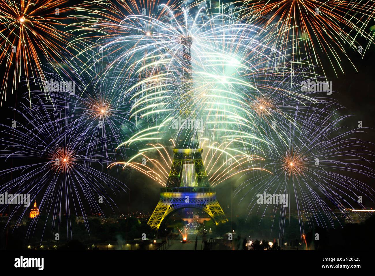 Fireworks illuminate the Eiffel Tower in Paris during Bastille Day ...