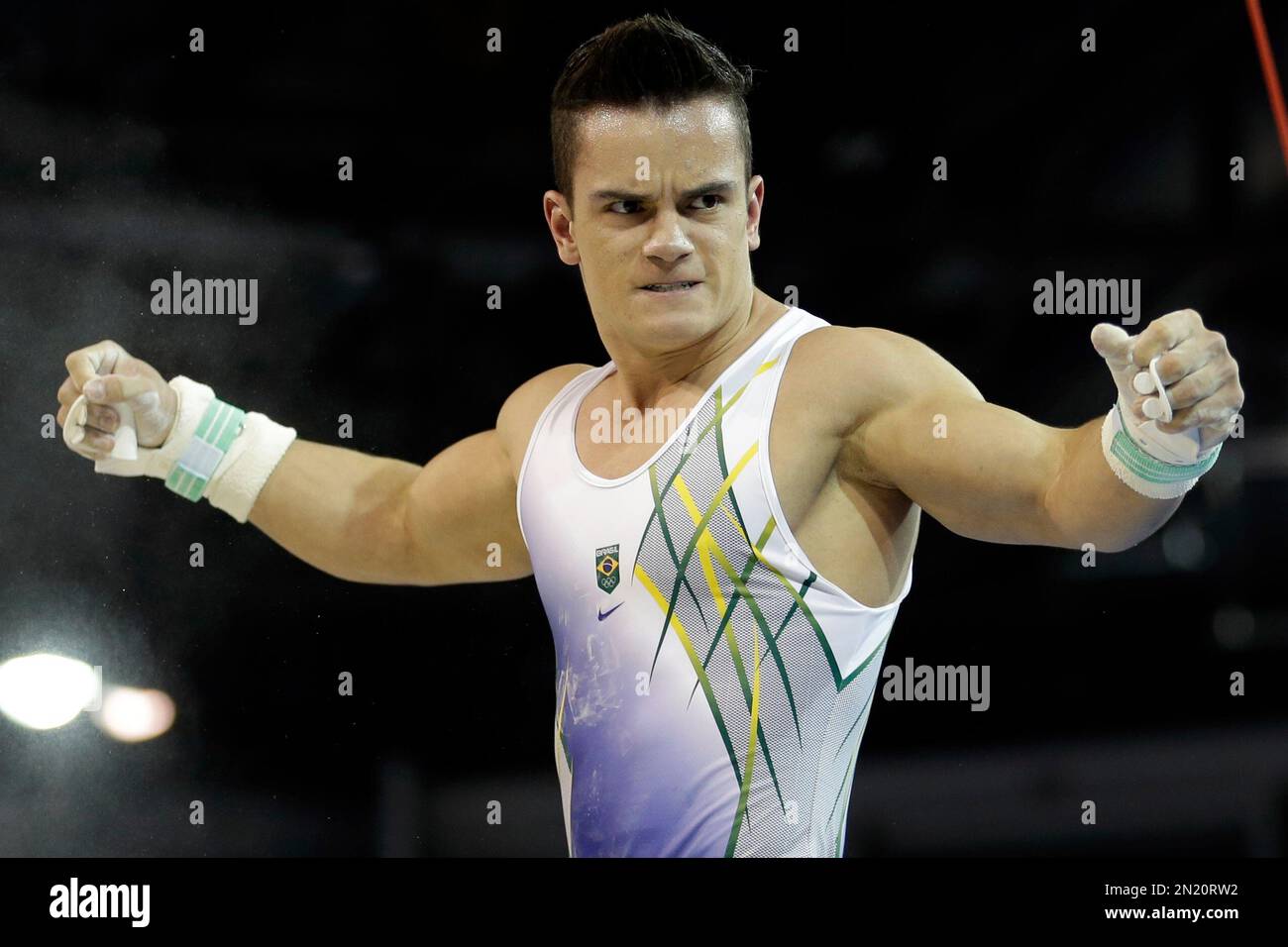 Brazil's Caio Souza reacts after finishing his routine on the rings ...