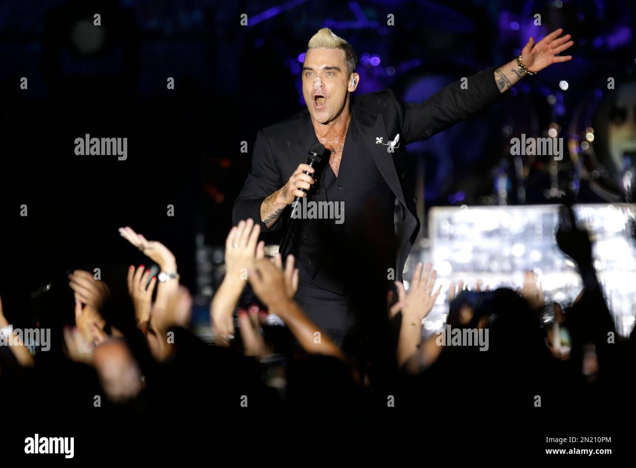 Singer Robbie Williams performs on stage during a concert to celebrate ...