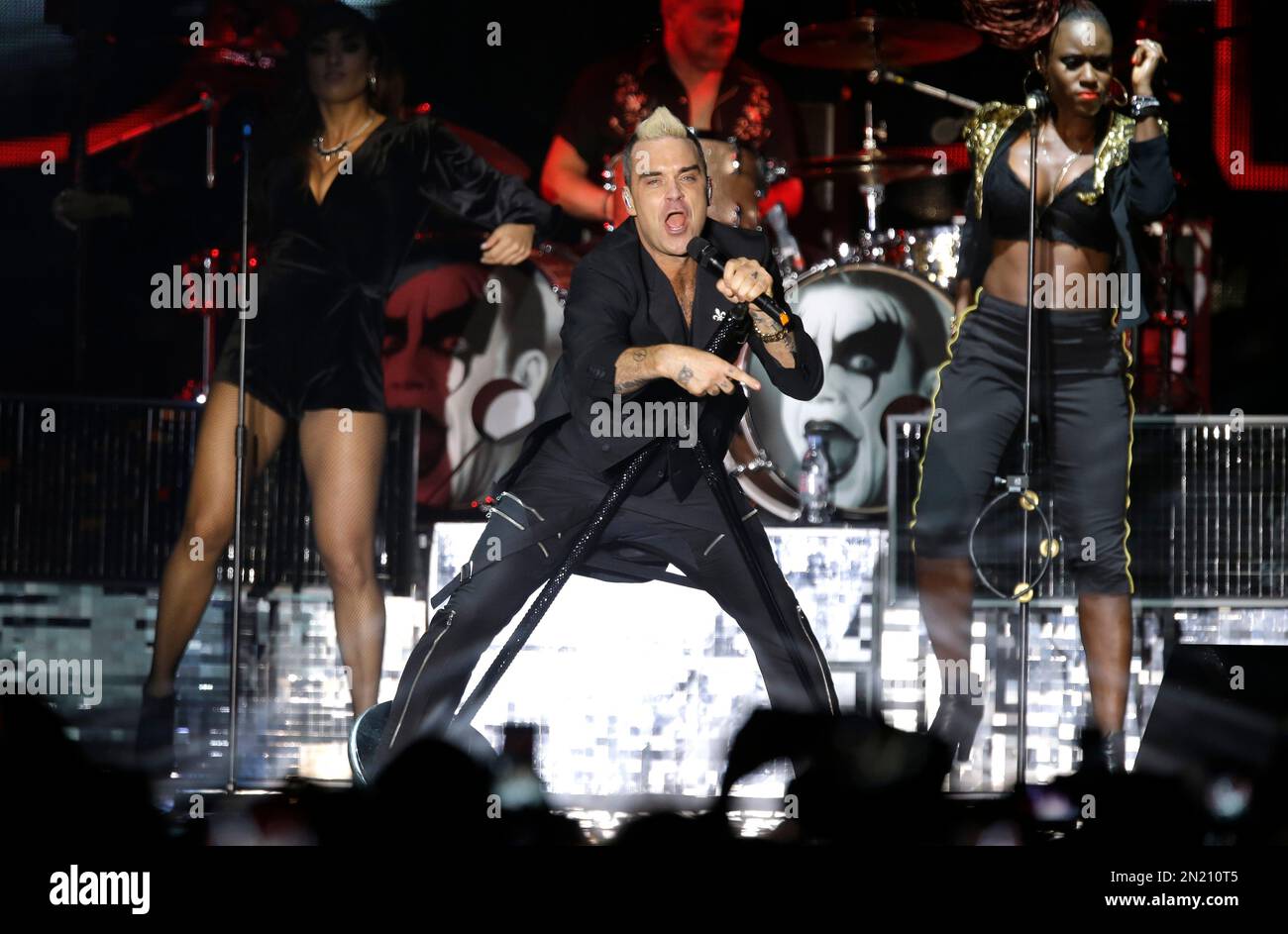 Singer Robbie Williams performs on stage during a concert to celebrate ...