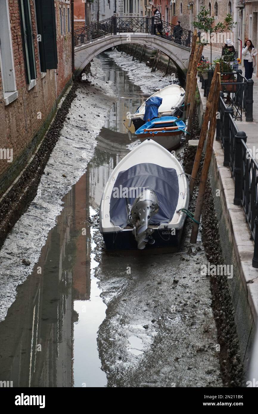 Boats lie on the bottom of dry water way, in st. Markus district ...
