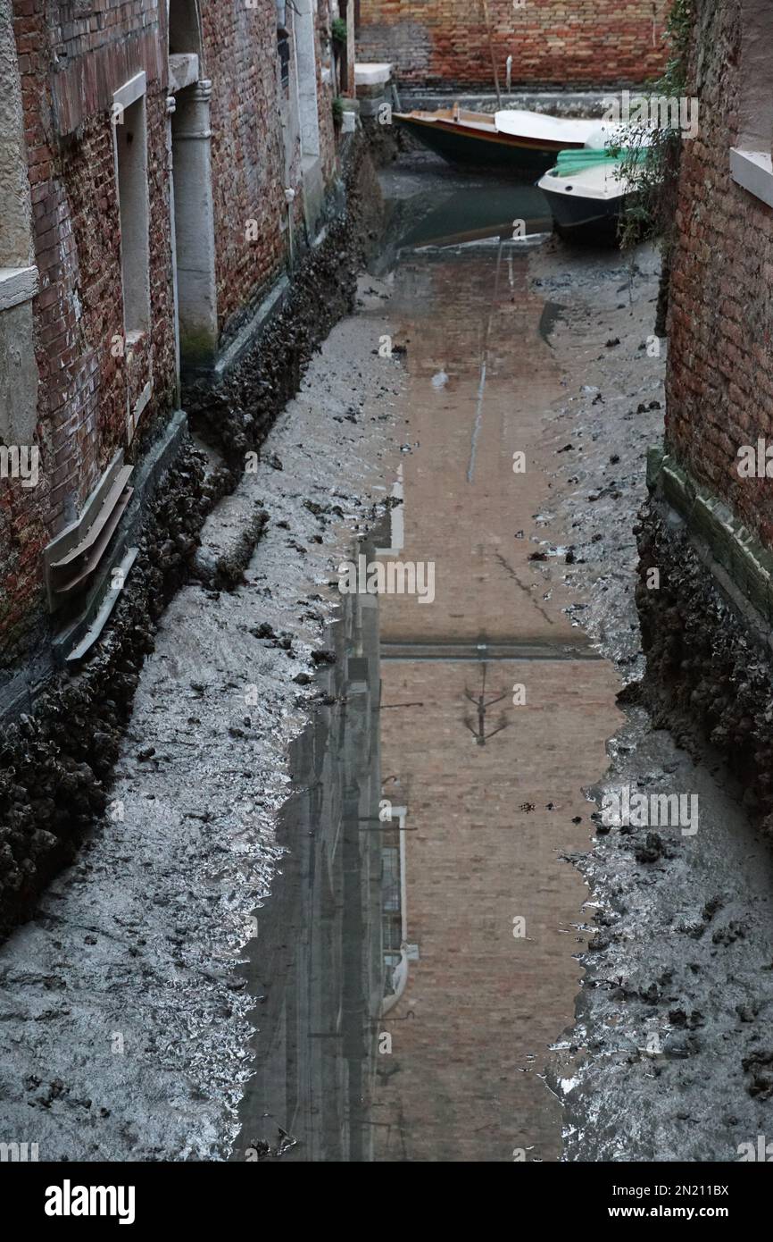 Boats lie on the bottom of dry water way, in st. Markus district ...