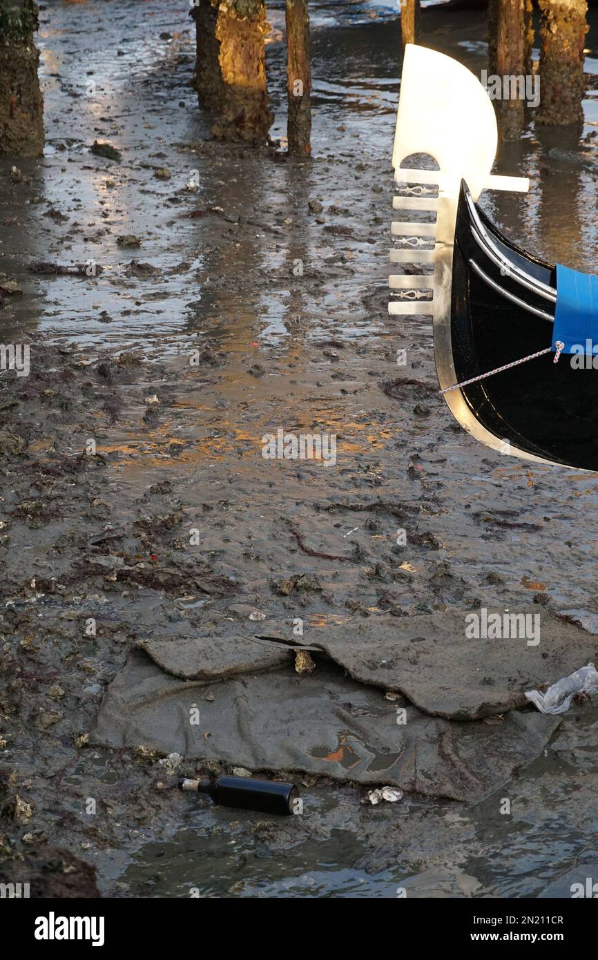 Gondolas lie on the bottom of the Grand Canal during an unusually low ...