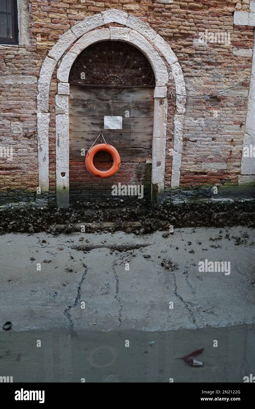 Mud covers the bottom of dry water way, in st. Markus district, during ...