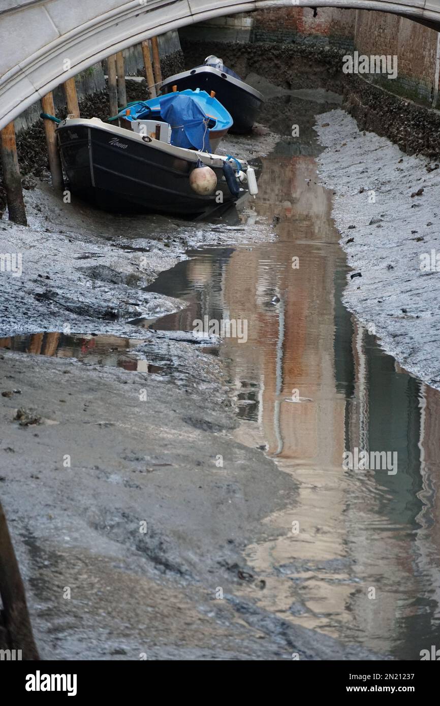 Boats lie on the bottom of dry water way, in st. Markus district ...