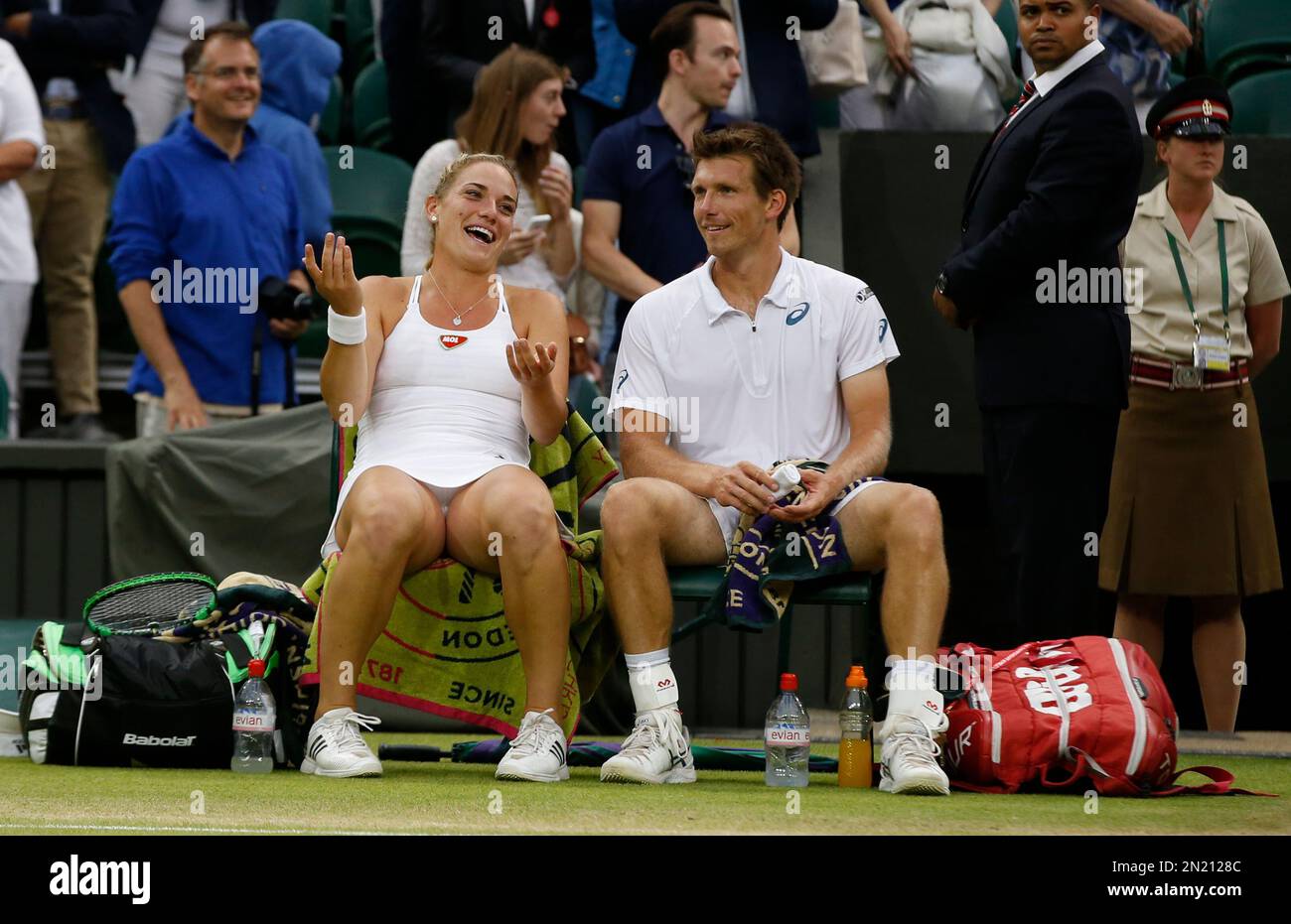 Alexander Peya of Austria, right, and Timea Babos of Hungary sit in ...