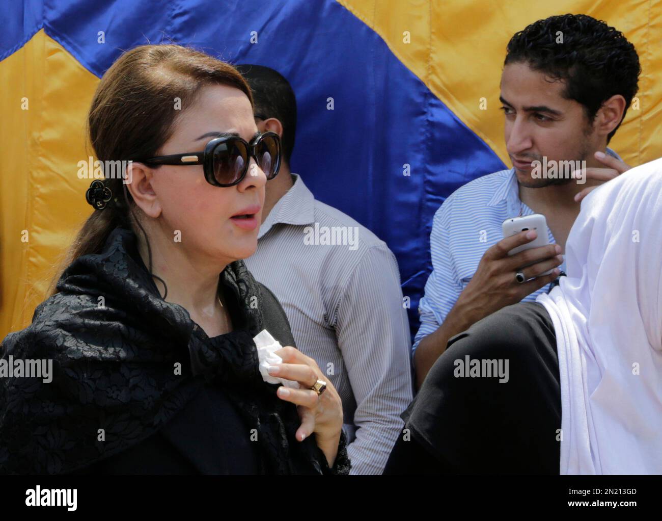 Lebanese actress Madeleine Tabar leaves following the burial of actor ...