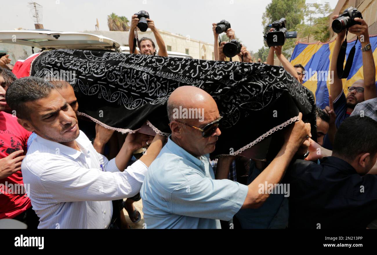 Mourners carry the coffin of Egyptian actor Omar Sharif during his ...