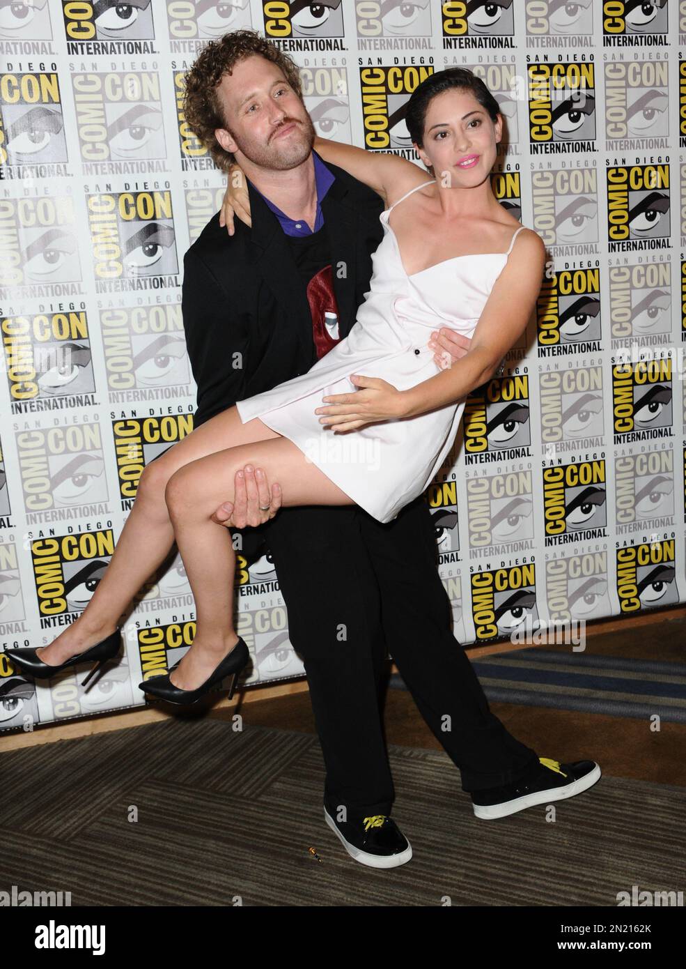 TJ Miller, background, and Rosa Salazar attend the 20th Century Fox ...