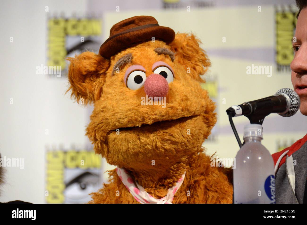 Fozzie Bear, left, and puppeteer Eric Jacobson attend "The Muppets ...