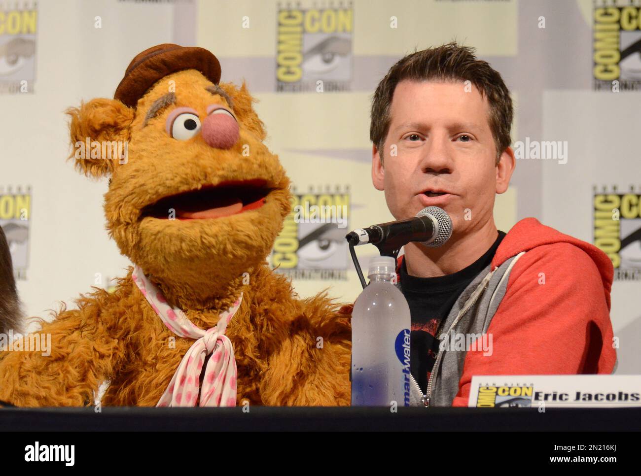 Fozzie Bear, left, and puppeteer Eric Jacobson attend "The Muppets ...