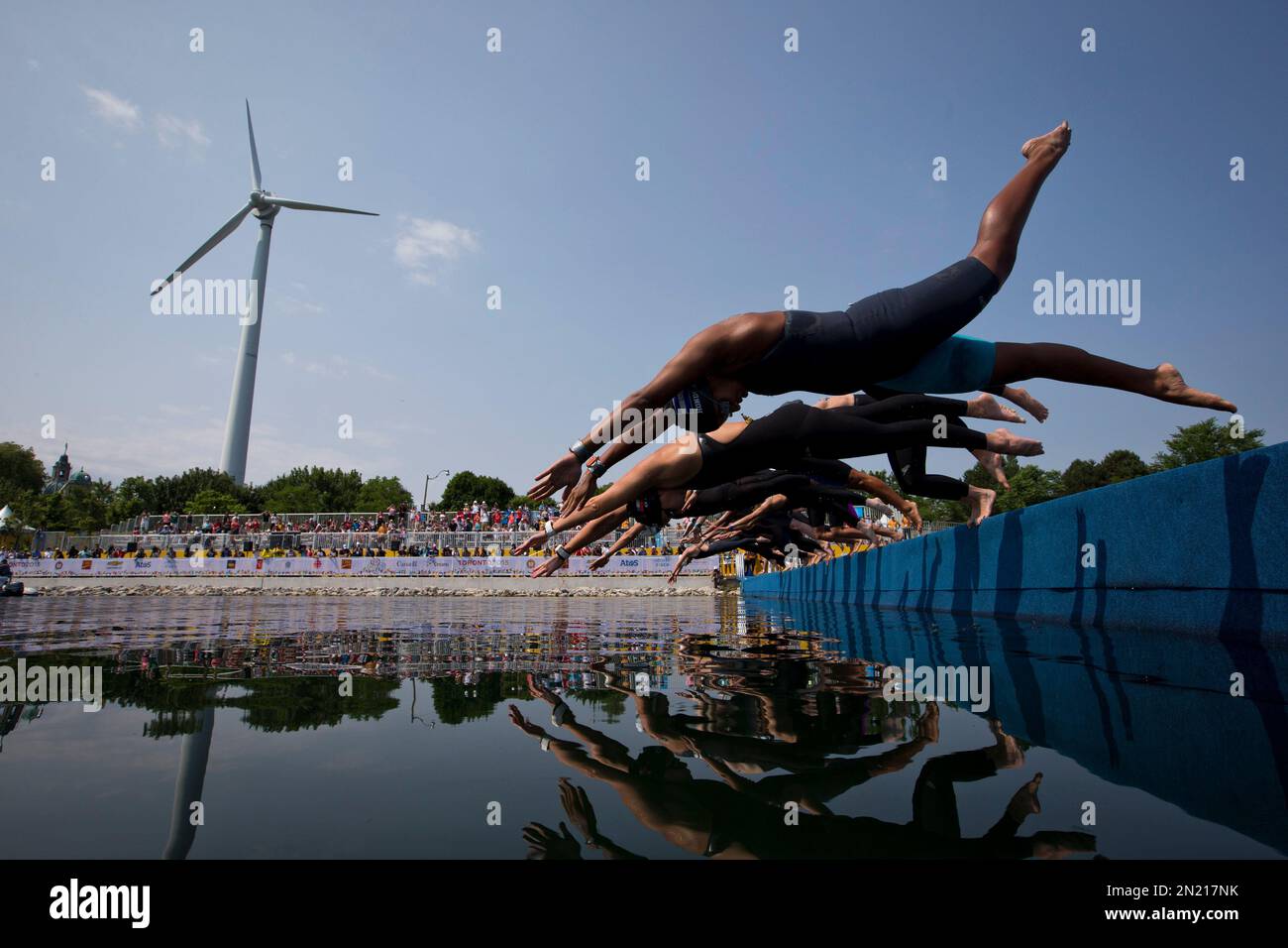 Hondura's Emma Quintanilla Lizano, top, and other competitors dive in ...