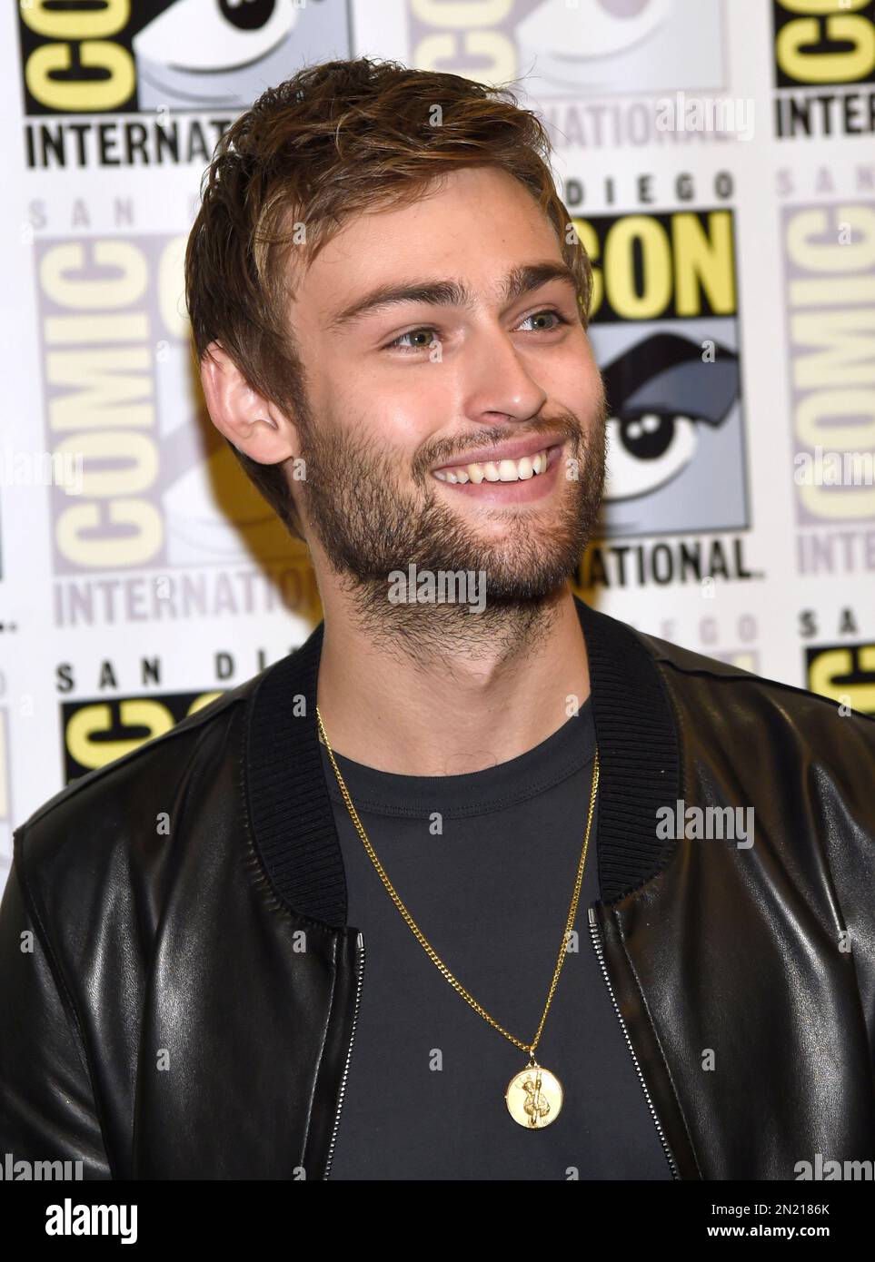 Douglas Booth attends the "Pride and Prejudice and Zombies" press line on day 3 of Comic-Con ...