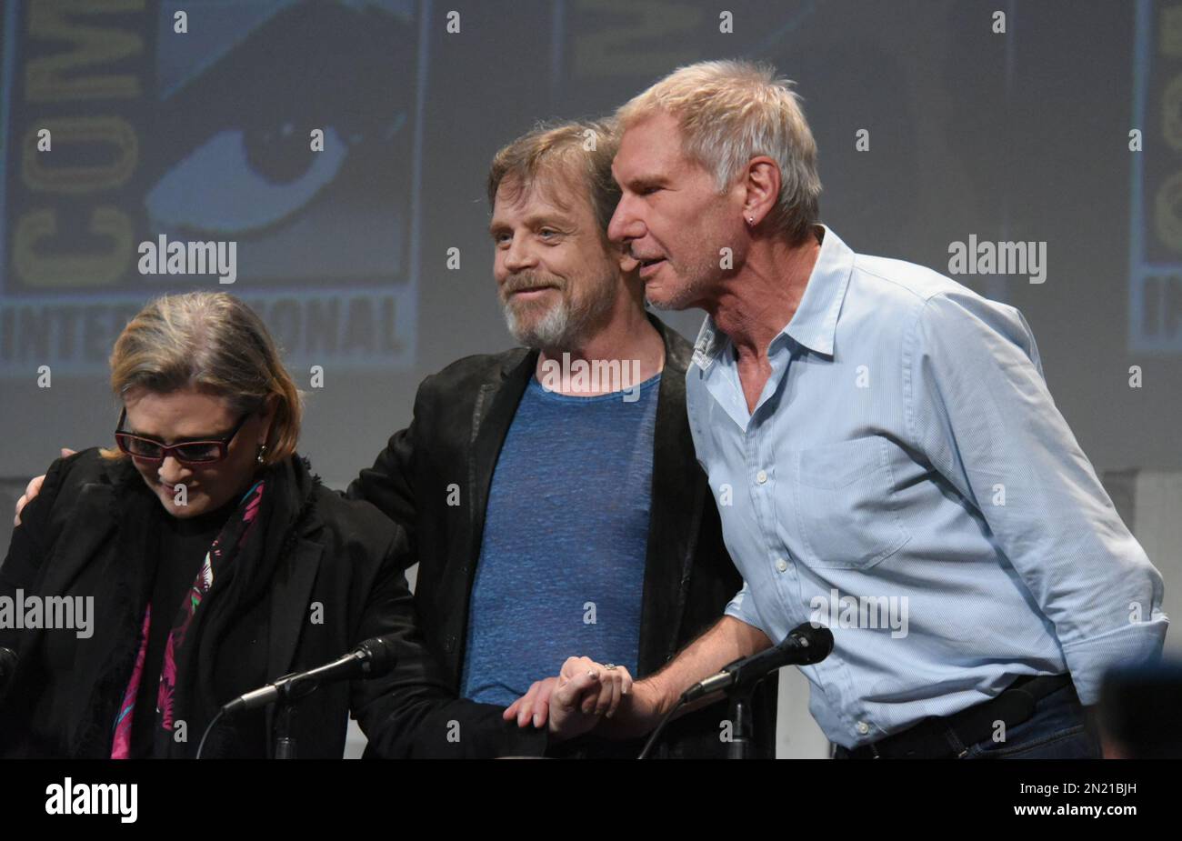 Carrie Fisher, from left, Mark Hamill, and Harrison Ford attend ...