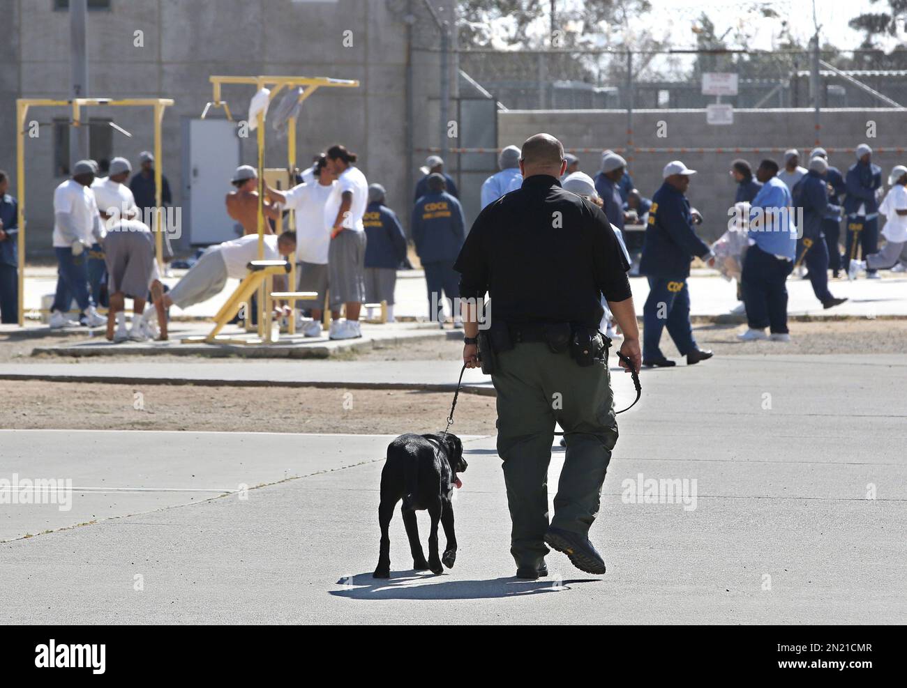 In this photo taken Wednesday May 20, 2015, inmates exercise in the ...