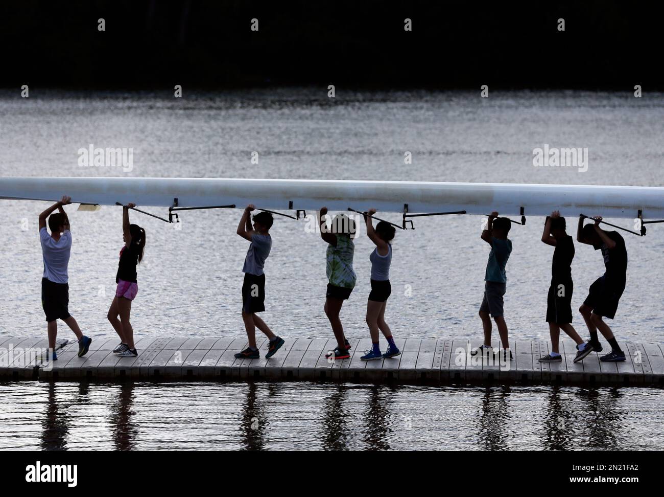 Rowers carry a shell after pulling if from the Hudson River during ...