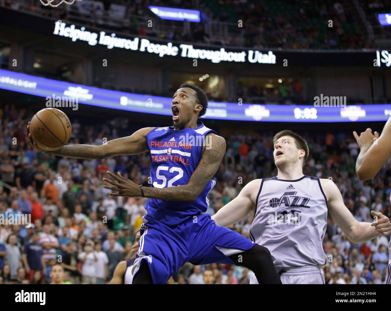Philadelphia 76ers' Jordan McRae (52) goes to the basket as Utah Jazz's ...