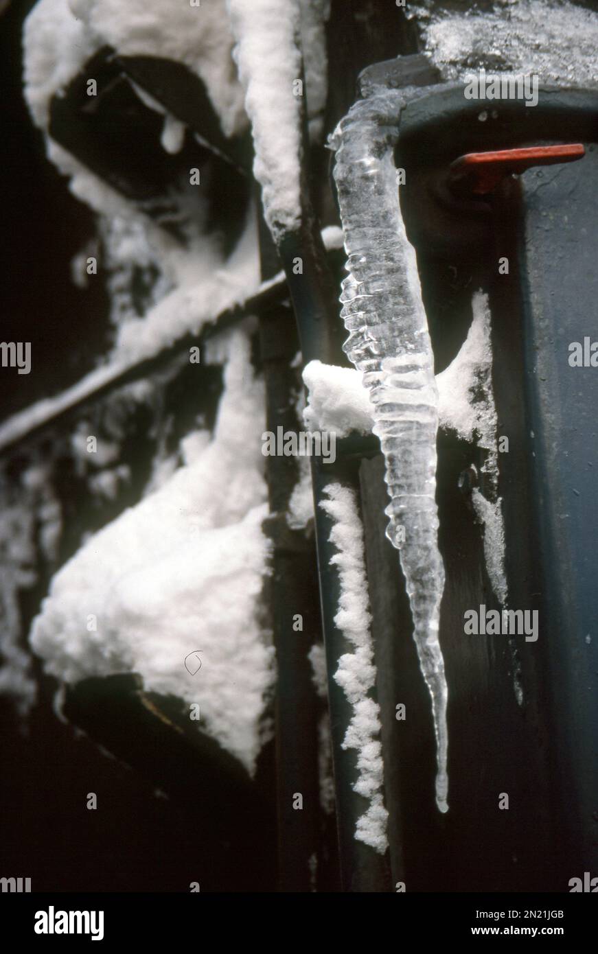 A massive icicle seen hanging off the rain gutter of a 4-EPB EMU at ...