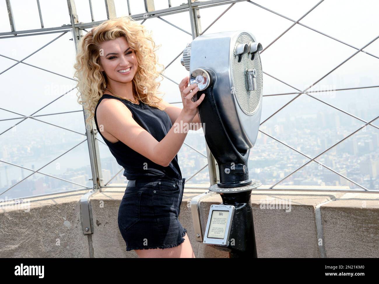 Singer Tori Kelly visits the Empire State Building to celebrate the ...