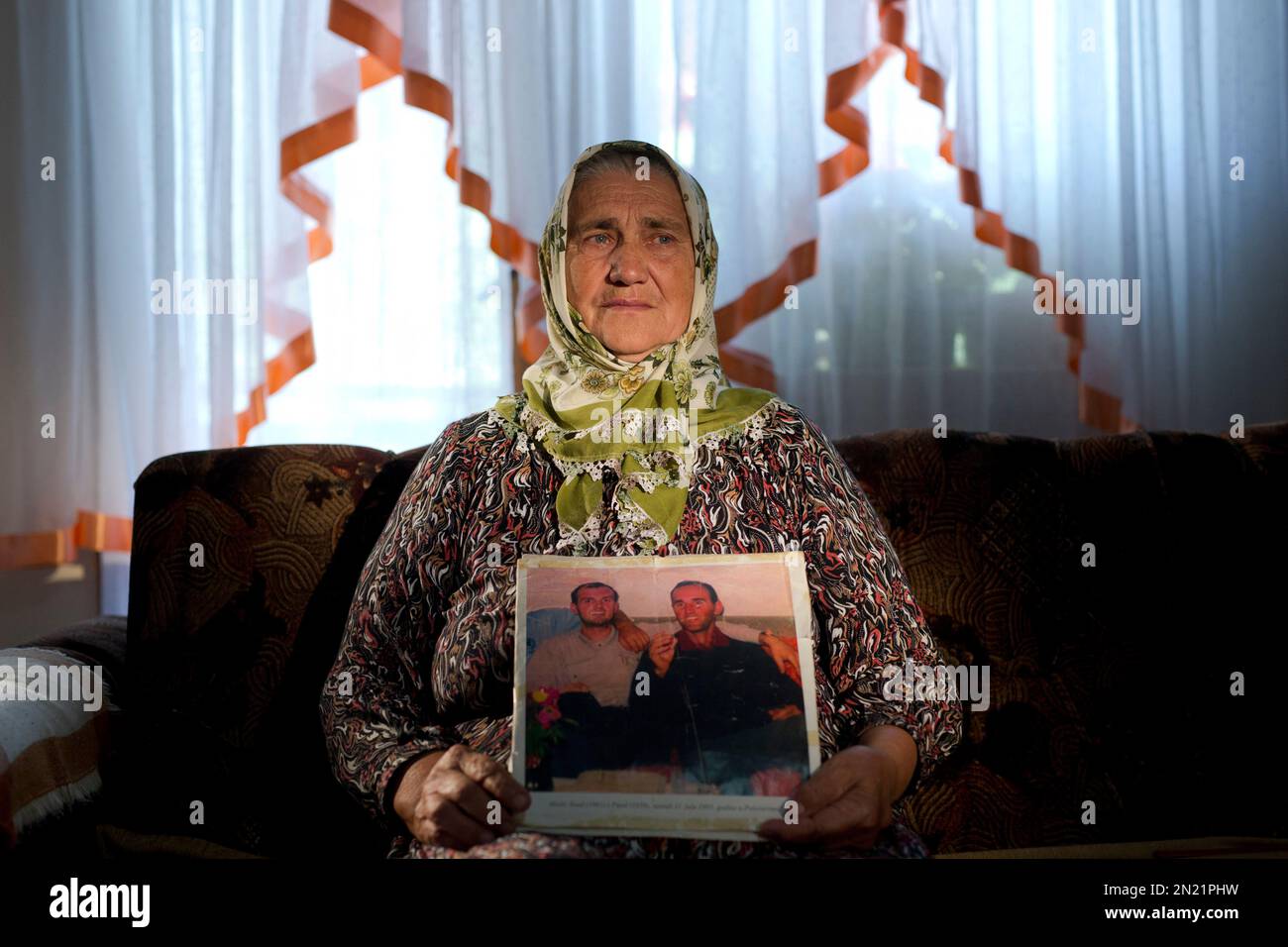 In this photo taken on Saturday, July 4, 2015, Suhra Malic, 80, poses ...