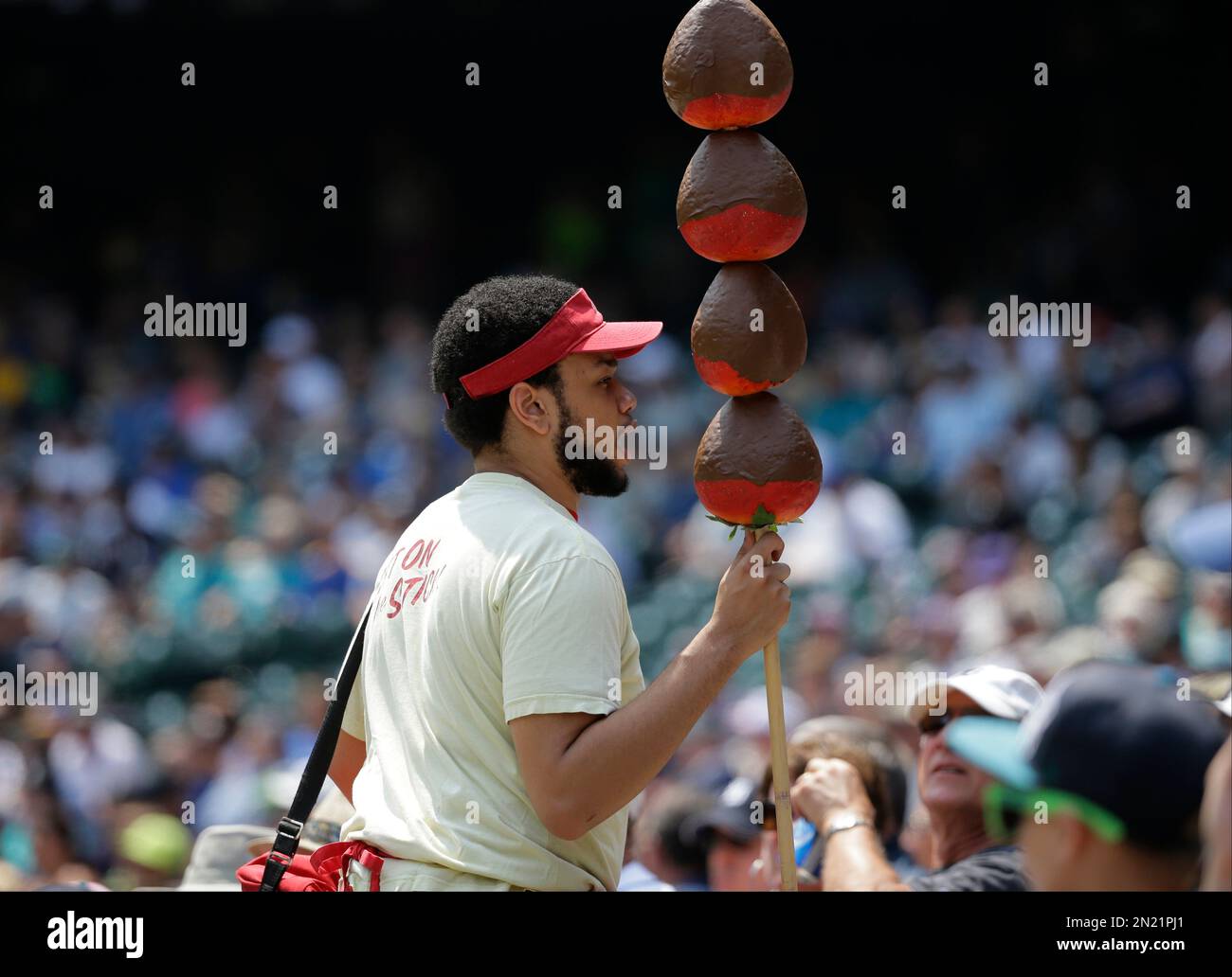 A ballpark food vendor sells "dingleberries," chocolate-dipped ...