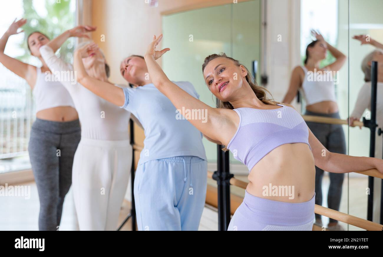 Adults learning to dance ballet in dancing school Stock Photo - Alamy