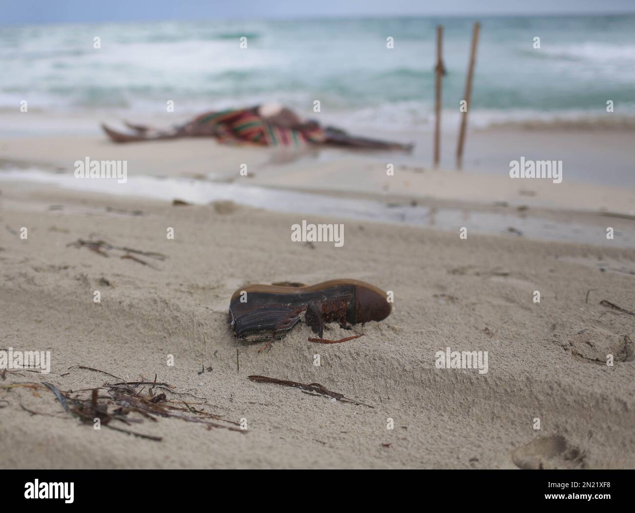 This Oct. 2, 2014 photo shows the clothes and shoes of migrants who ...
