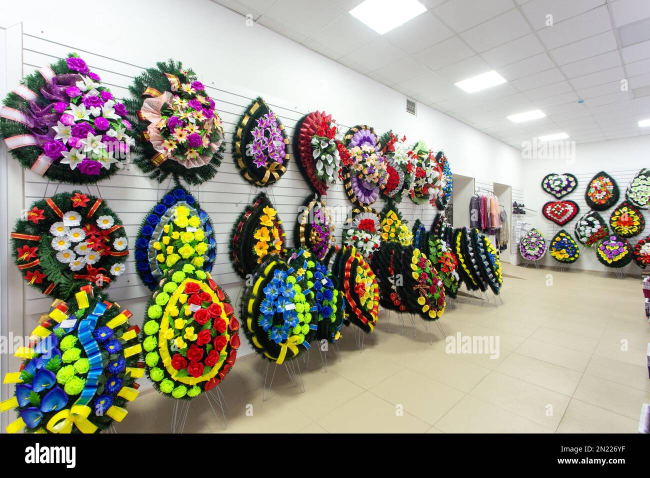 Interior of shop with funeral accessories. Shop selling coffins ...