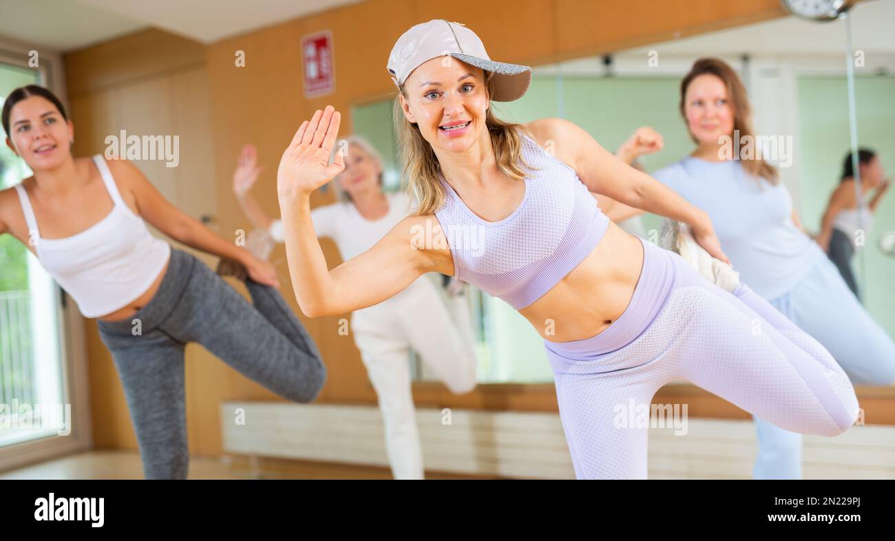 Dynamic middle-aged woman dancing hip-hop Stock Photo - Alamy