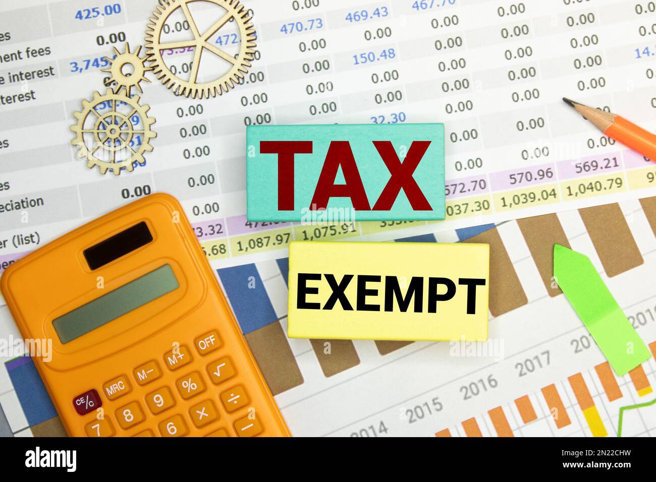 TAX EXEMPT sign on the piece of paper Stock Photo - Alamy
