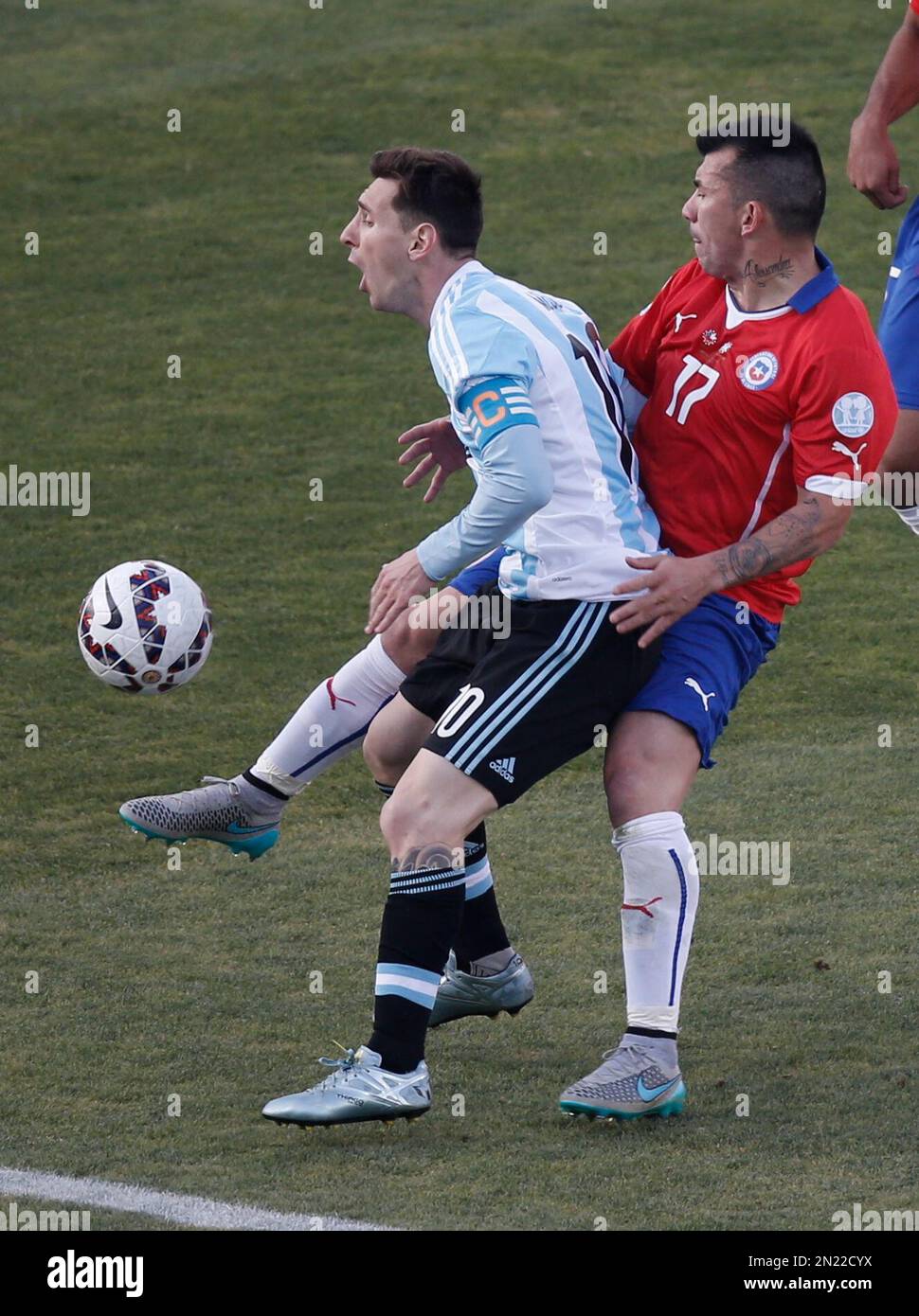 Argentina's Lionel Messi, ground, reacts after being fouled by Chile's ...