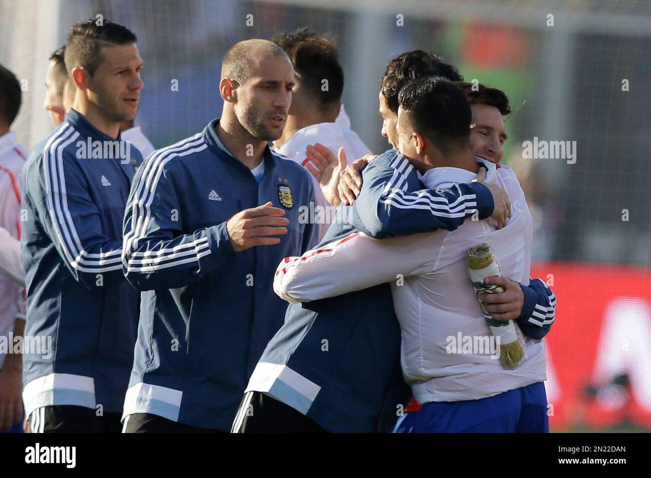 Chile's Alexis Sanchez, right, hugs Argentina's Lionel Messi during the ...