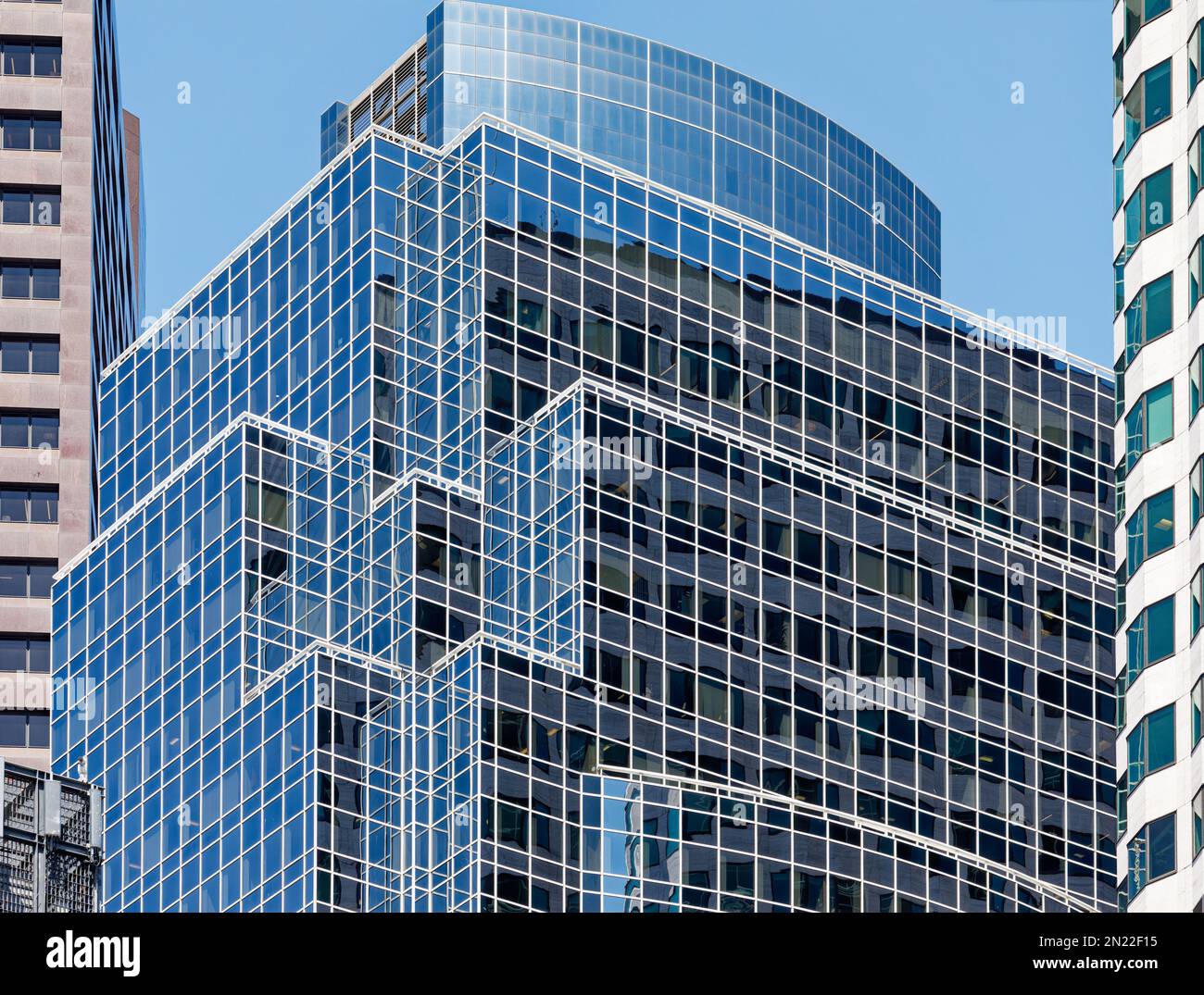 Boston Financial District: 100 High Street reflects all around it in ...