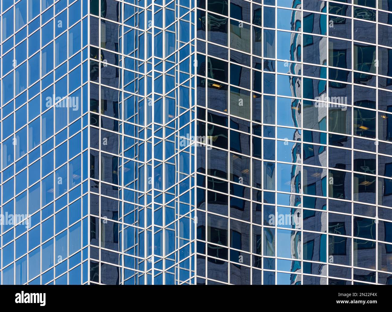 Boston Financial District: 100 High Street reflects all around it in ...