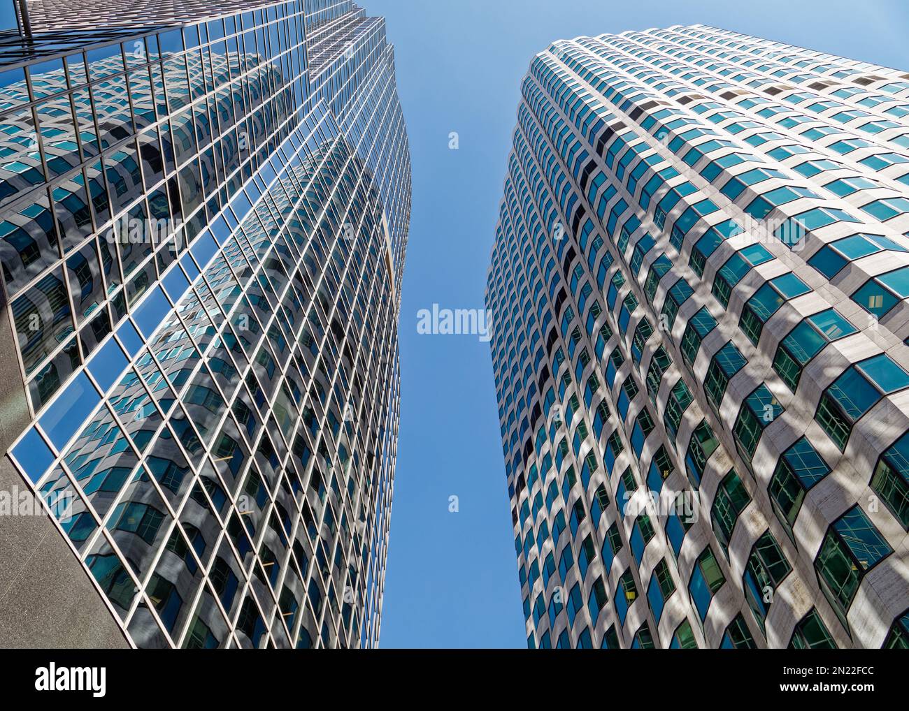 Boston Financial District: 100 High Street (left) reflects all around ...