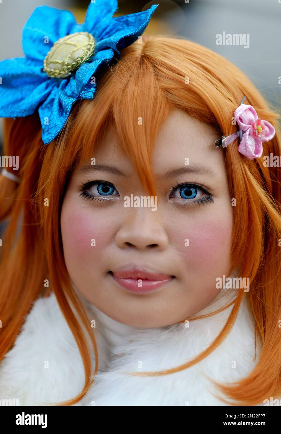 An Anime fan in costume poses for a photo at the 24th annual Anime Expo ...