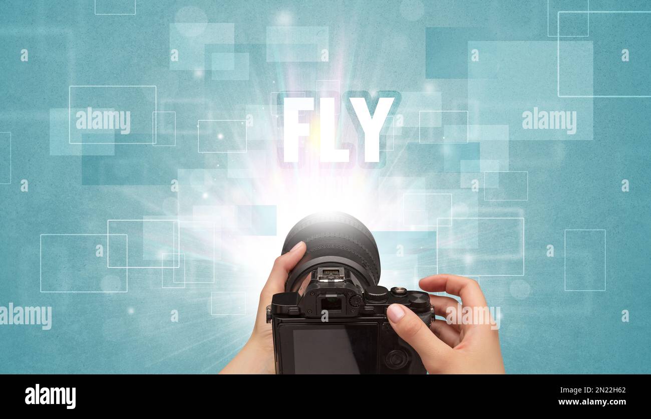 hand holding digital camera, traveling concept Stock Photo - Alamy