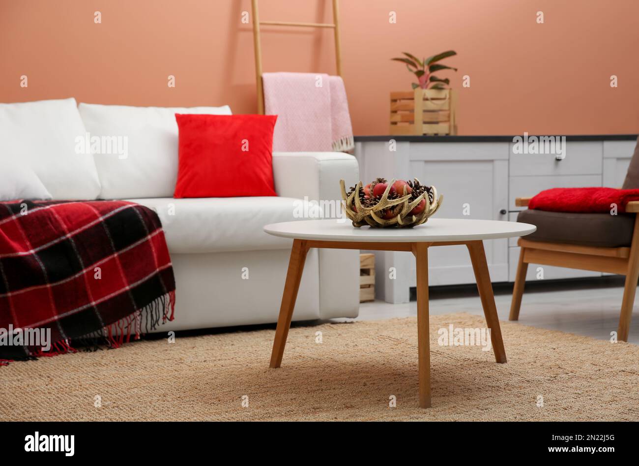 Cozy living room interior inspired by autumn colors Stock Photo - Alamy