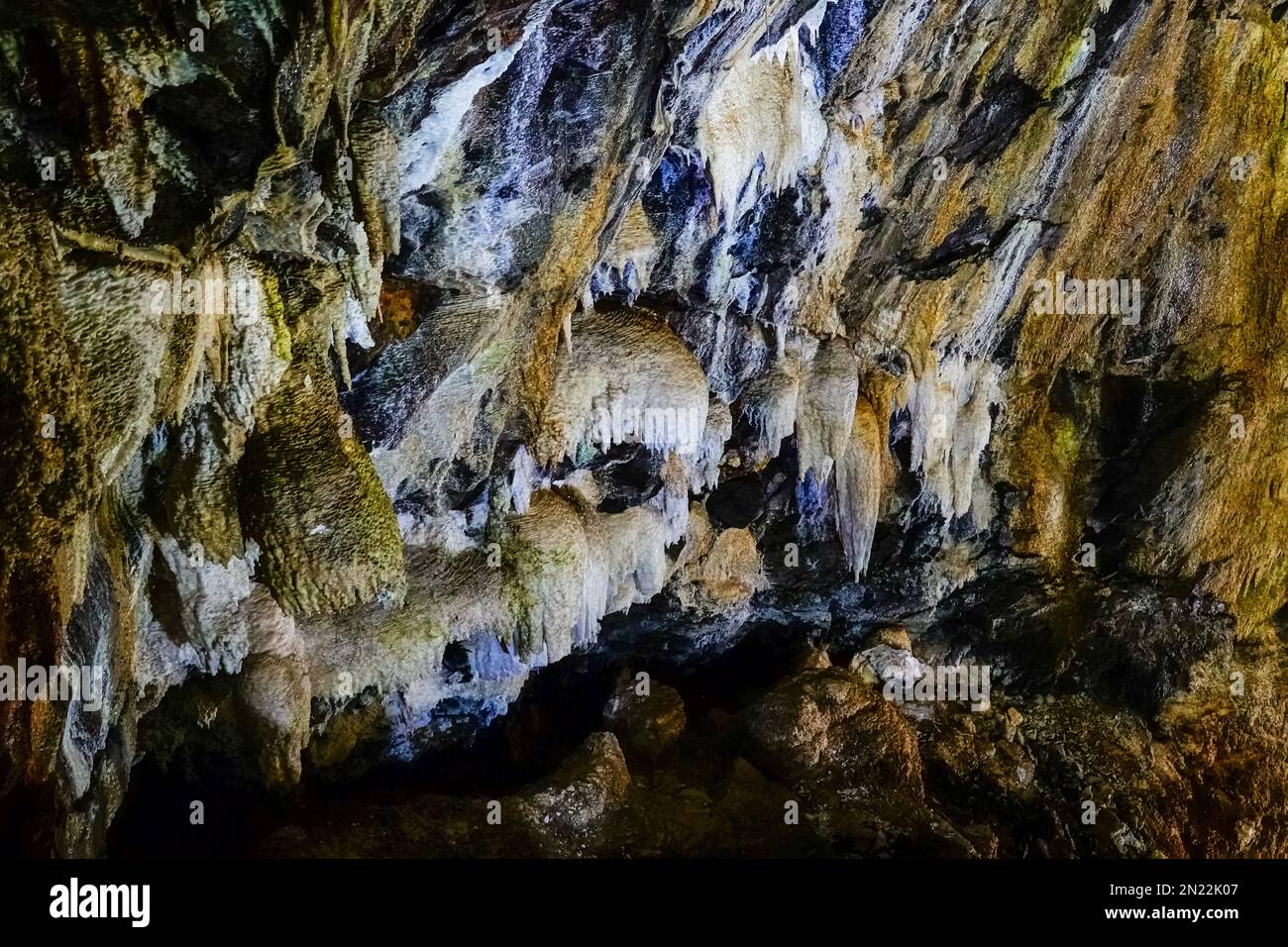 Silicate stalactites inside the Algar do Carvão a vertical lava tube ...