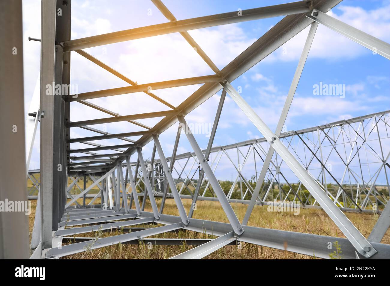 High voltage tower construction outdoors. Installation of electrical ...